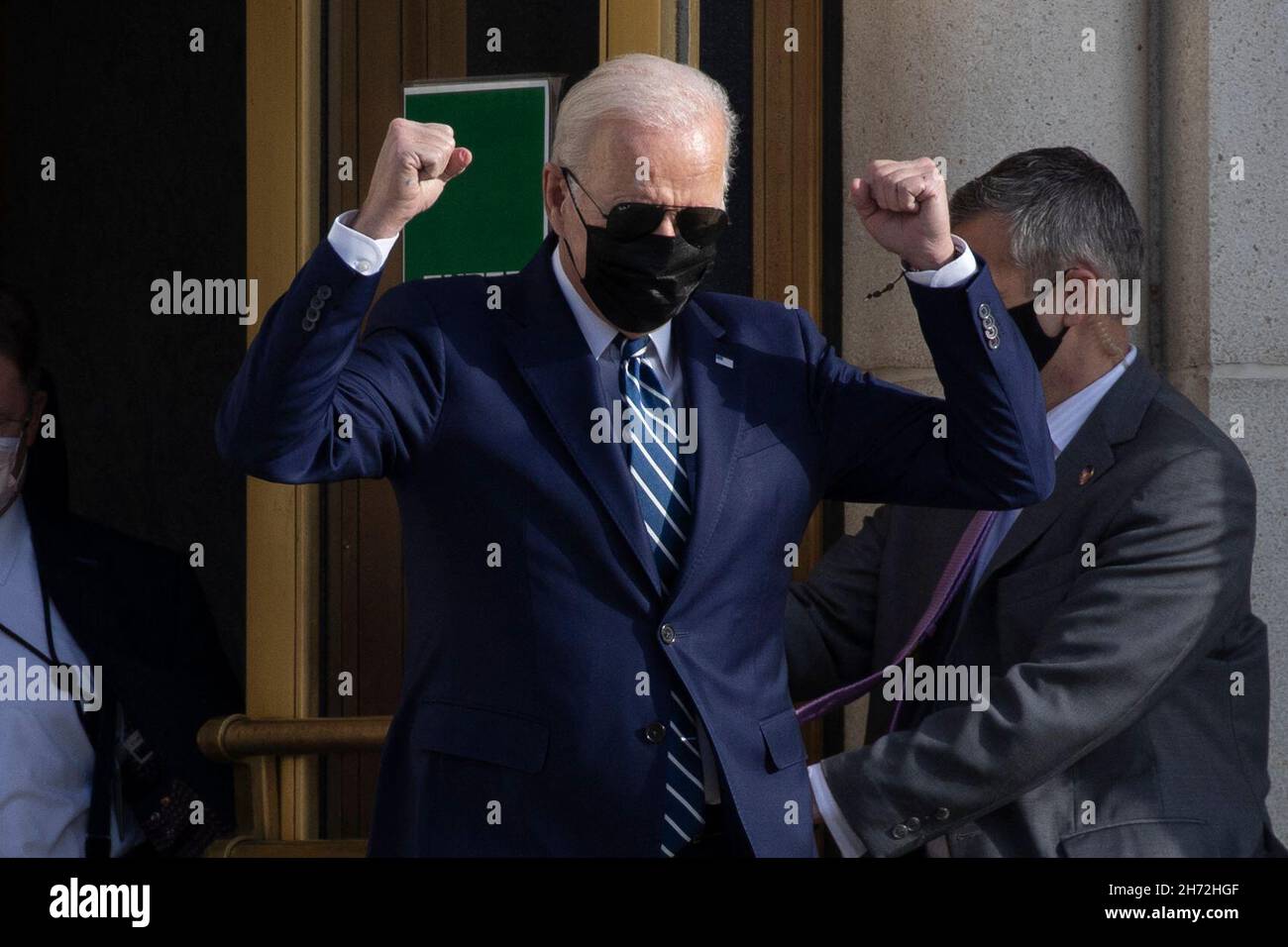 US President Joe Biden gestures upon leaving Walter Reed Medical Center ...