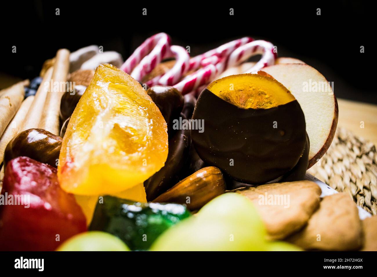 Sweets and fruits served as a dessert Stock Photo - Alamy