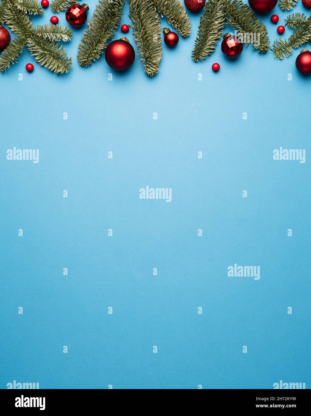 Blue Christmas background with decorative border made of Christmas ...