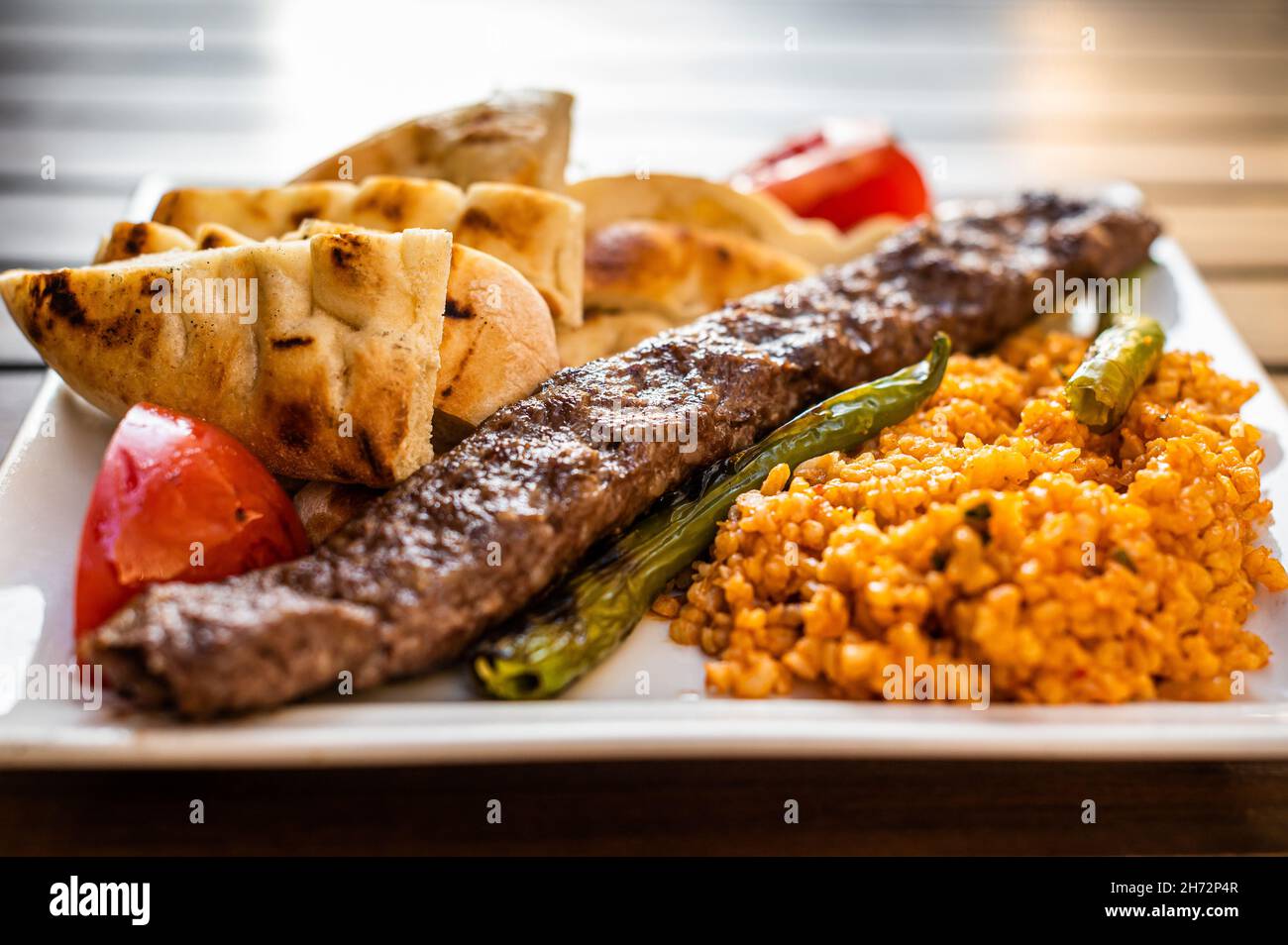 Traditional Turkish Adana kebab or kebap meat food with marinated ...