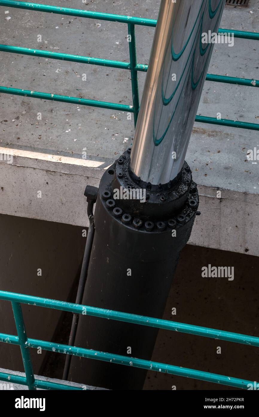 Big hydraulic cylinder for a bridge above the ship lock Stock Photo - Alamy