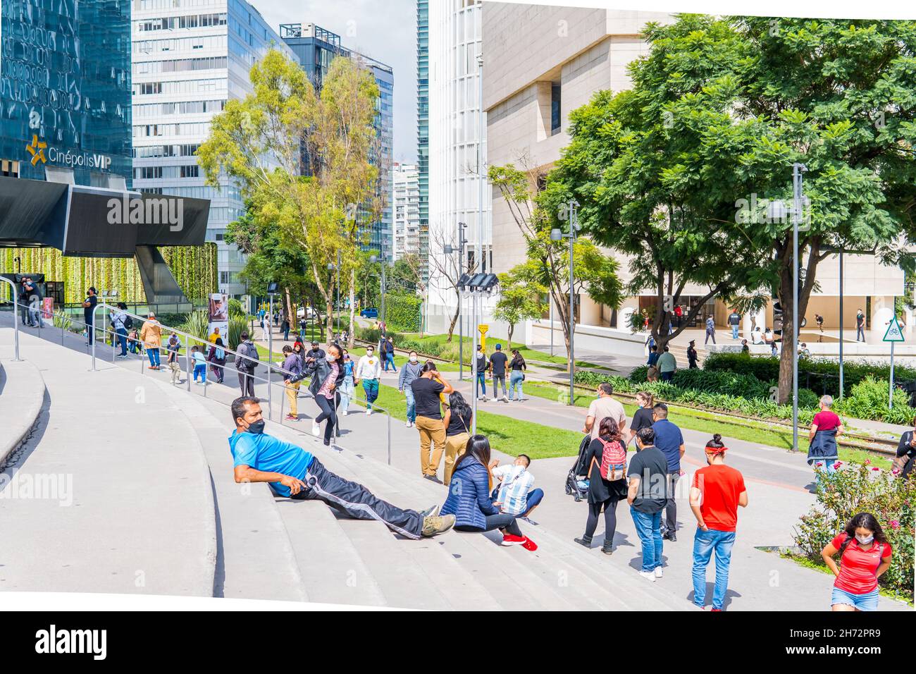 Group of people sitting on the stairs in a park in Polanco, Mexico ...