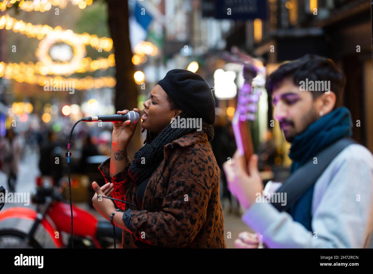 EDITORIAL USE ONLY Call me Unique performs at the launch of Seven Dials ...
