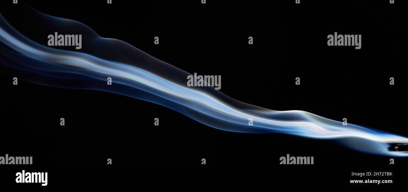 blue smoke on black background with abstract blur motion wave swirl ...