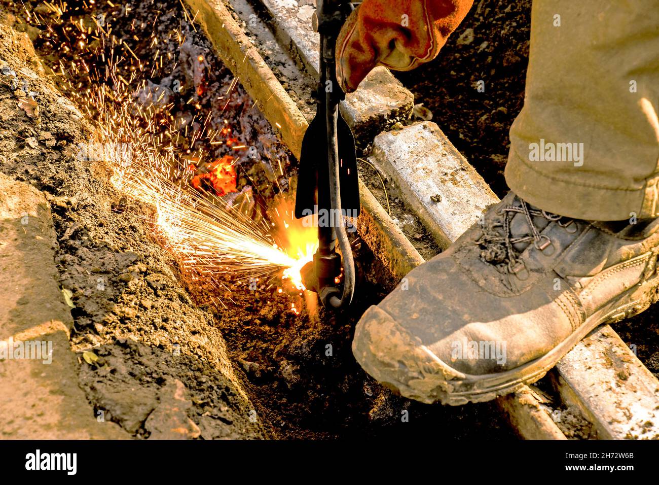 Close-up of the hand of an industrial worker working on the process of ...