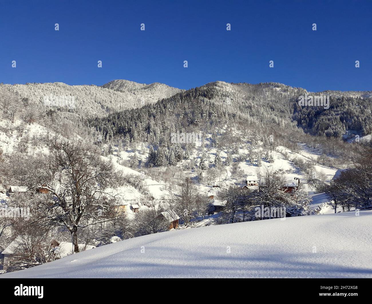 Tranquil scenery of a snowy mountain in freezing winter Stock Photo - Alamy