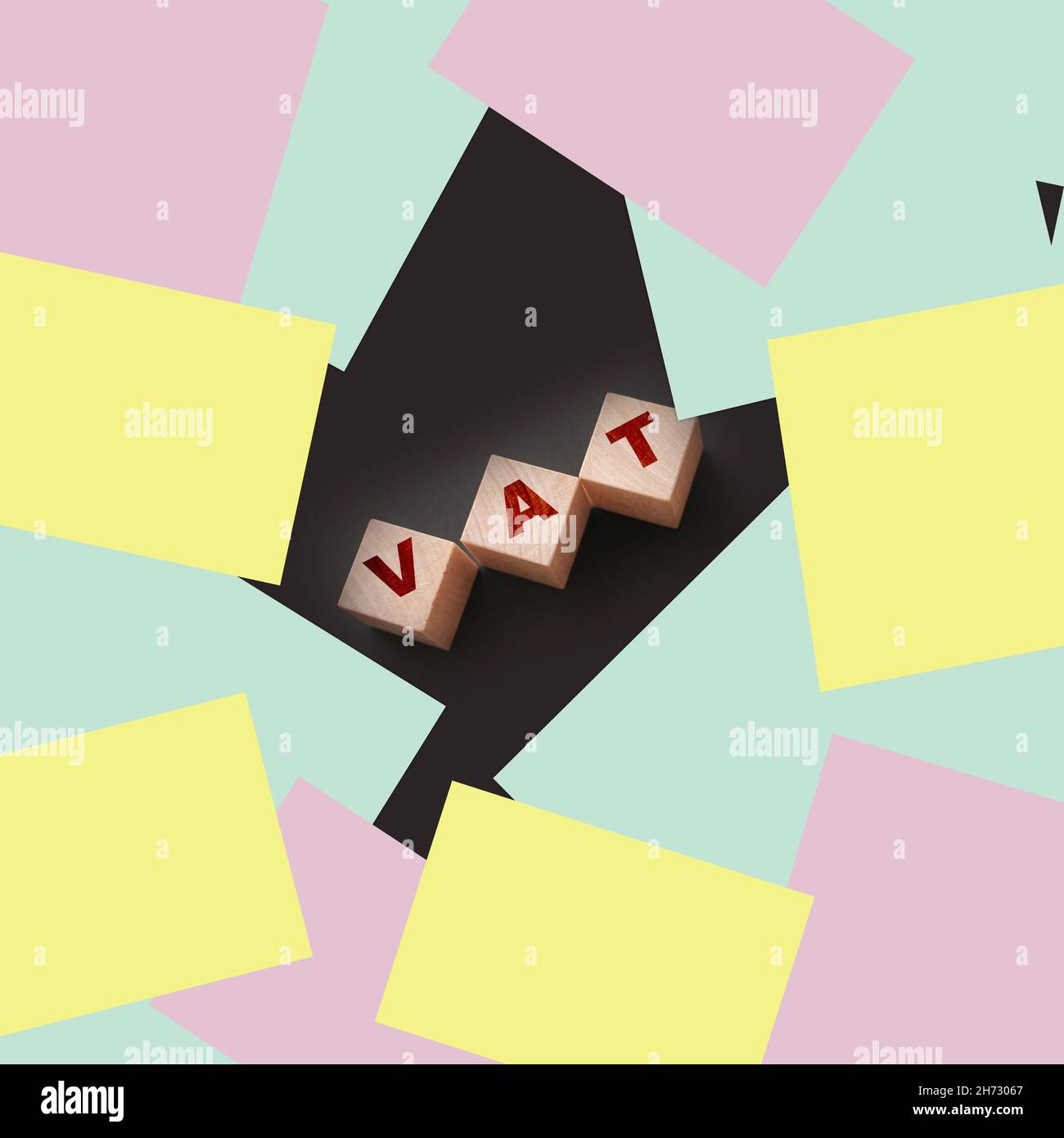 VAT letters on wooden cubes. Value Added Tax Financial concept Stock ...