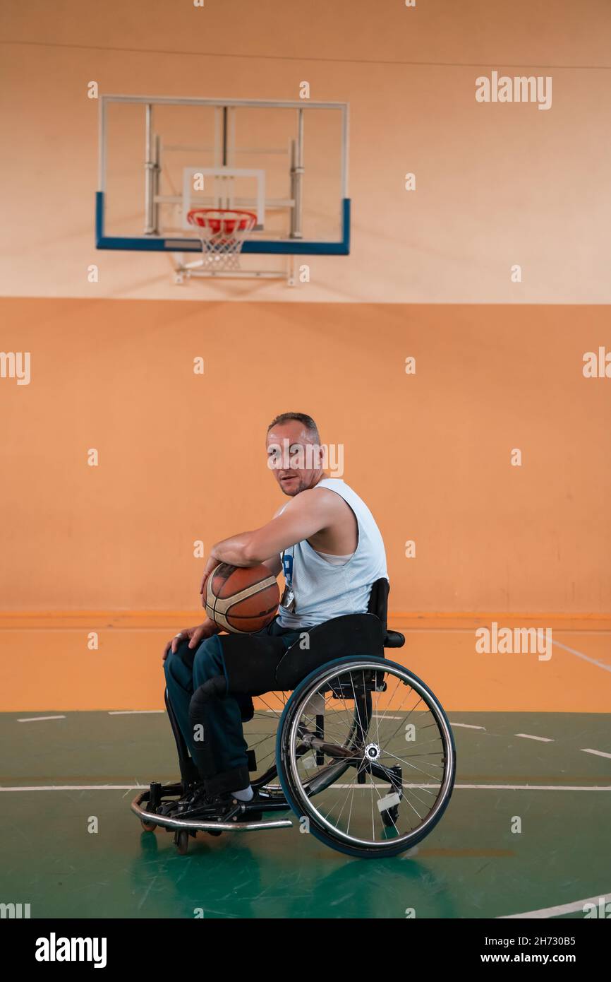 a photo of a war veteran playing basketball in a modern sports arena ...