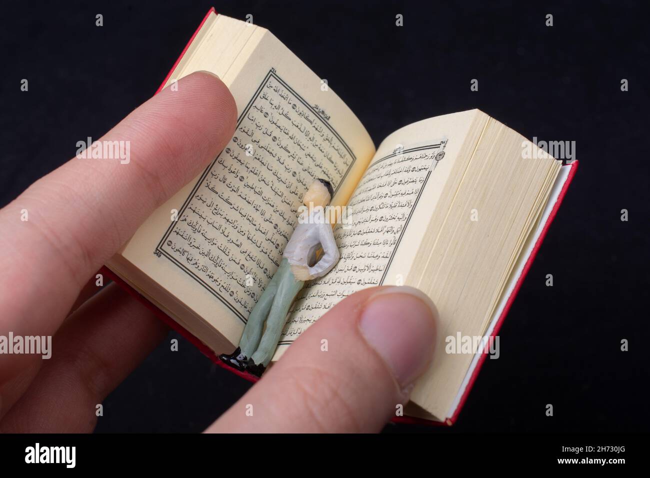 Islamic Holy Book Quran mini size Stock Photo - Alamy