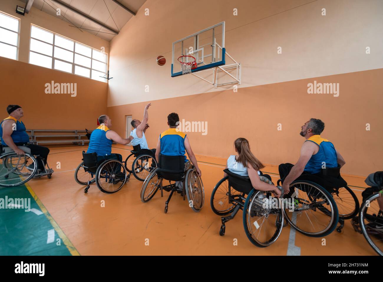 Disabled War veterans mixed race and age basketball teams in ...