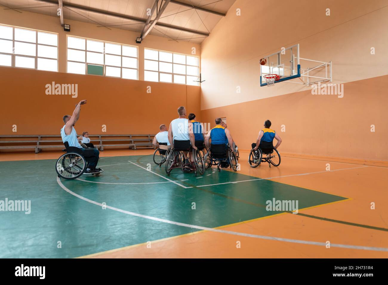 Disabled War veterans mixed race and age basketball teams in ...