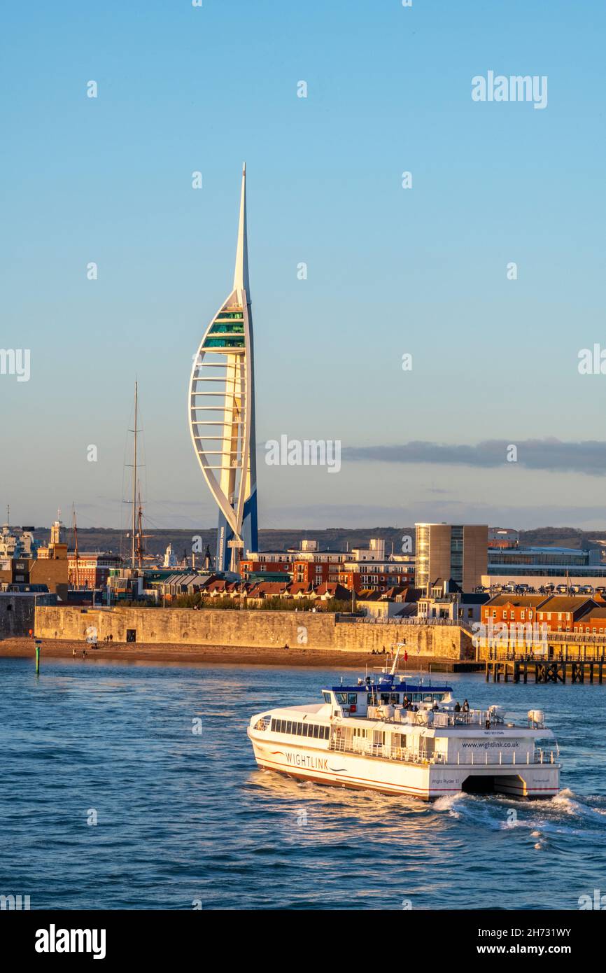 isle of wight ferry passing the spinnaker tower at the entrance to portsmouth harbour, isle of ...