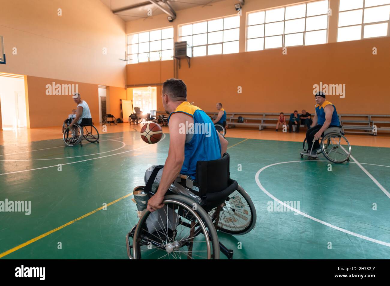 Disabled War veterans mixed race and age basketball teams in ...