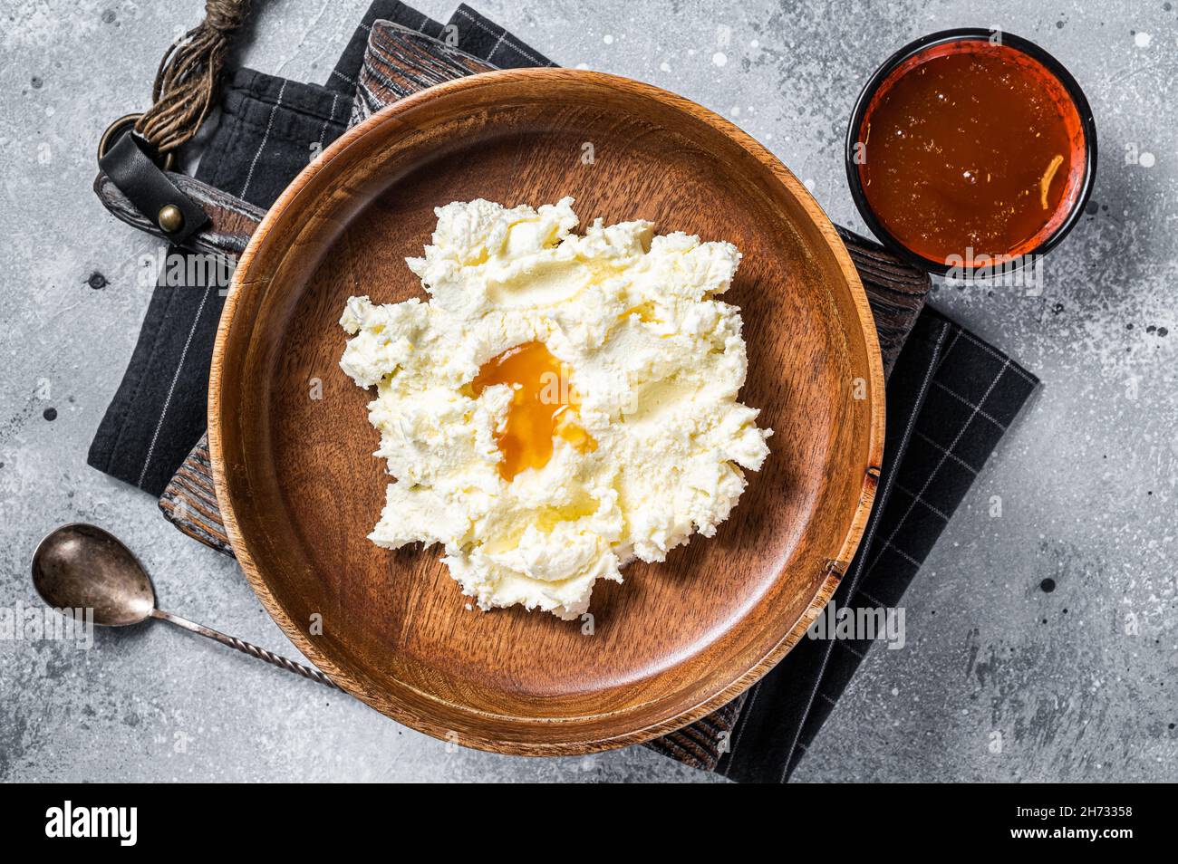 Tradirional Turkish cuisine - kaymak clotted cream and honey. Gray ...