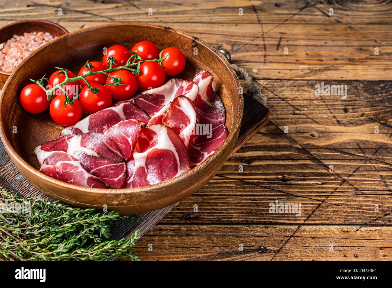 Italian sliced cured coppa ham with spices. wooden background. Top view ...