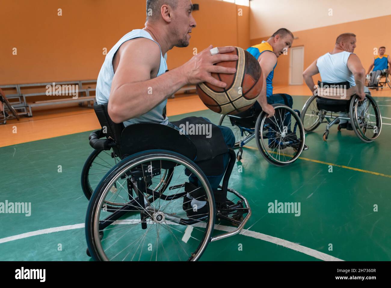 Disabled War veterans mixed race and age basketball teams in ...