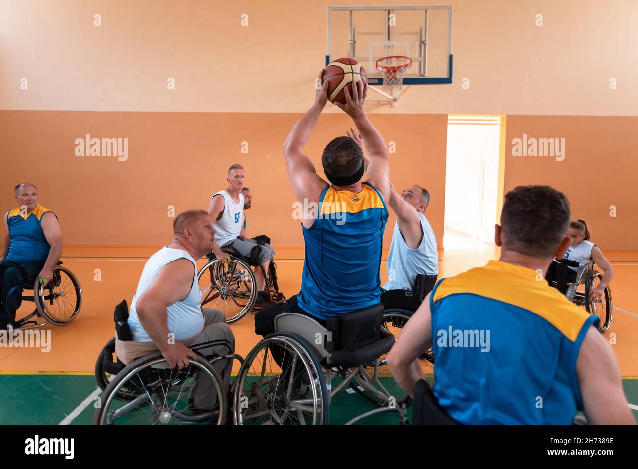 Disabled War veterans mixed race and age basketball teams in ...