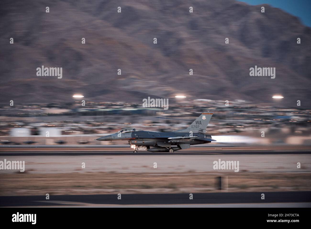 A F-16 Fighting Falcon assigned to the 64th Aggressor Squadron, takes ...