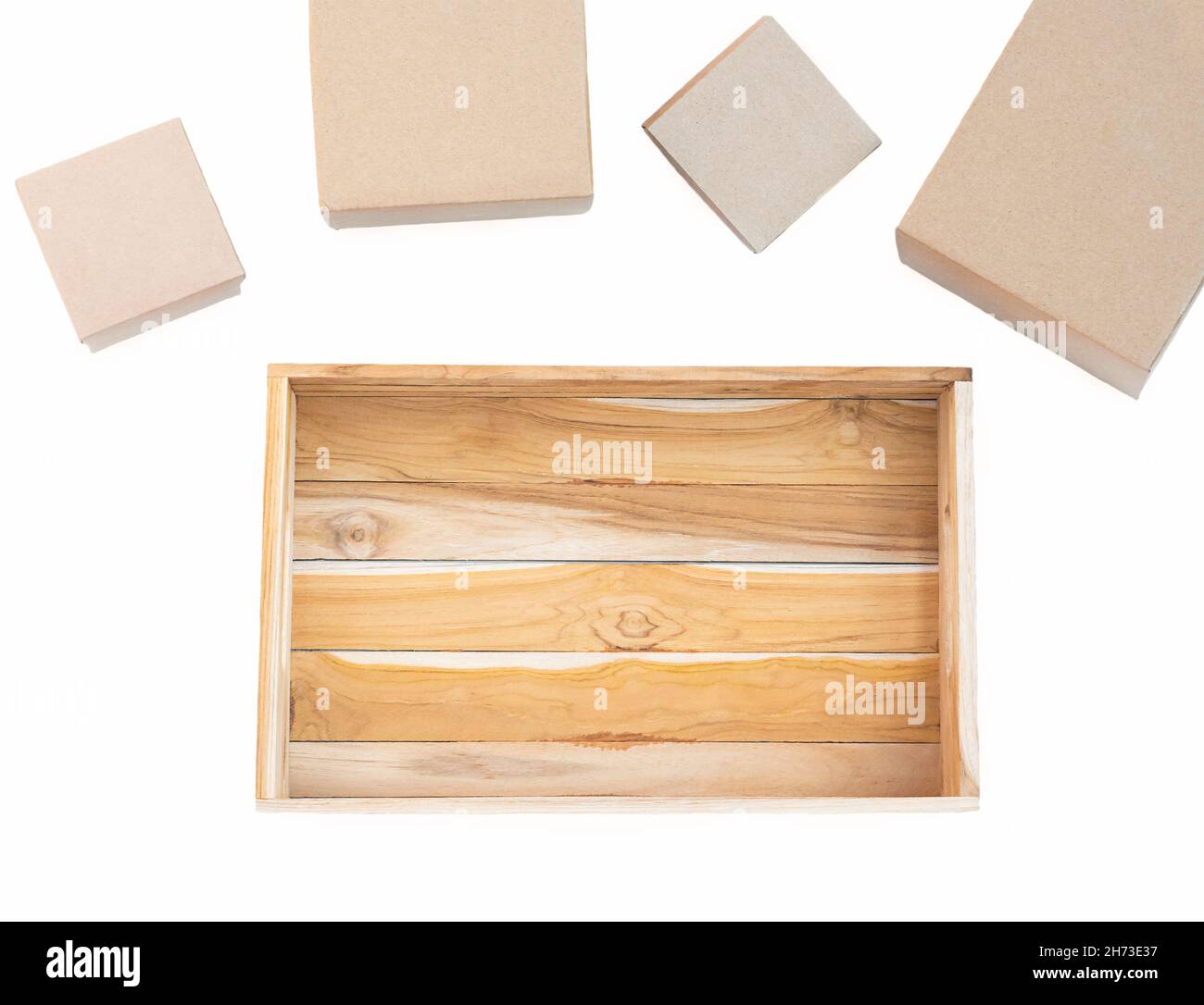 wooden box with different types of cardboard boxes Isolated on white ...