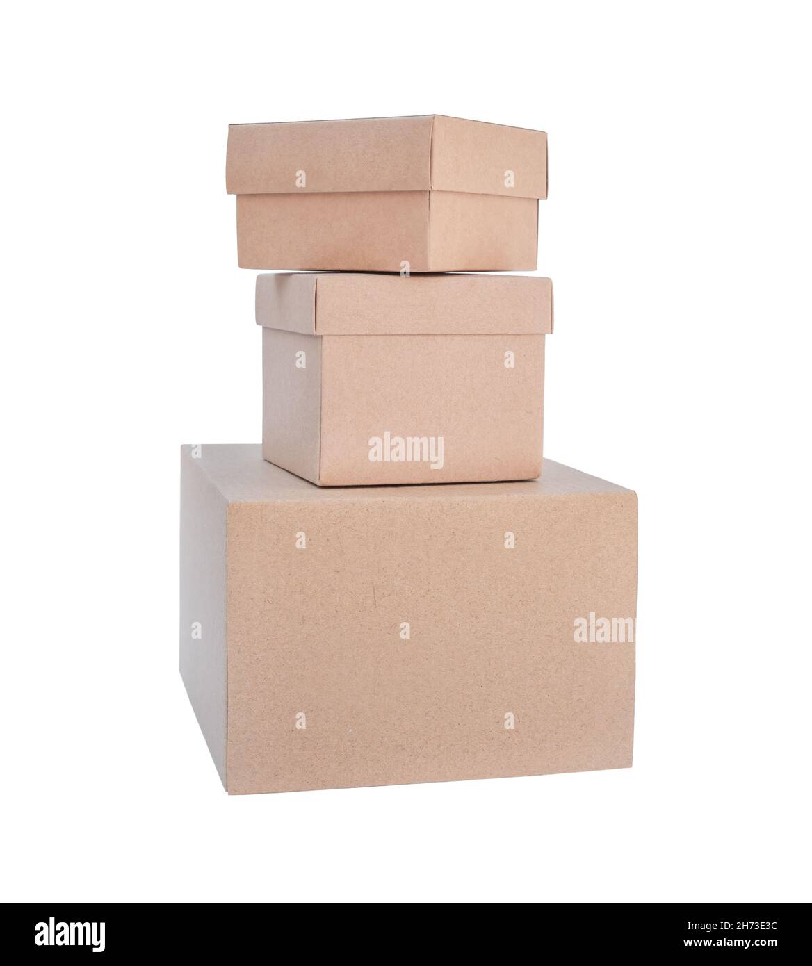 three cardboard boxes isolated. boxes stand on top of each other on a ...