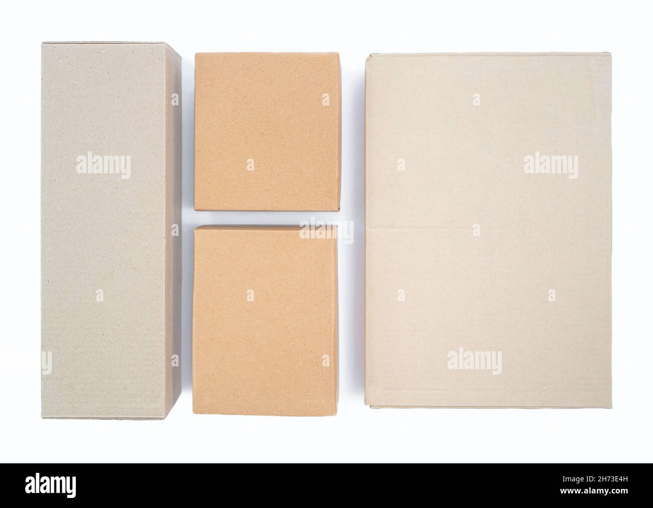 Cardboard boxes on a white background. Flat lay geometry Stock Photo ...