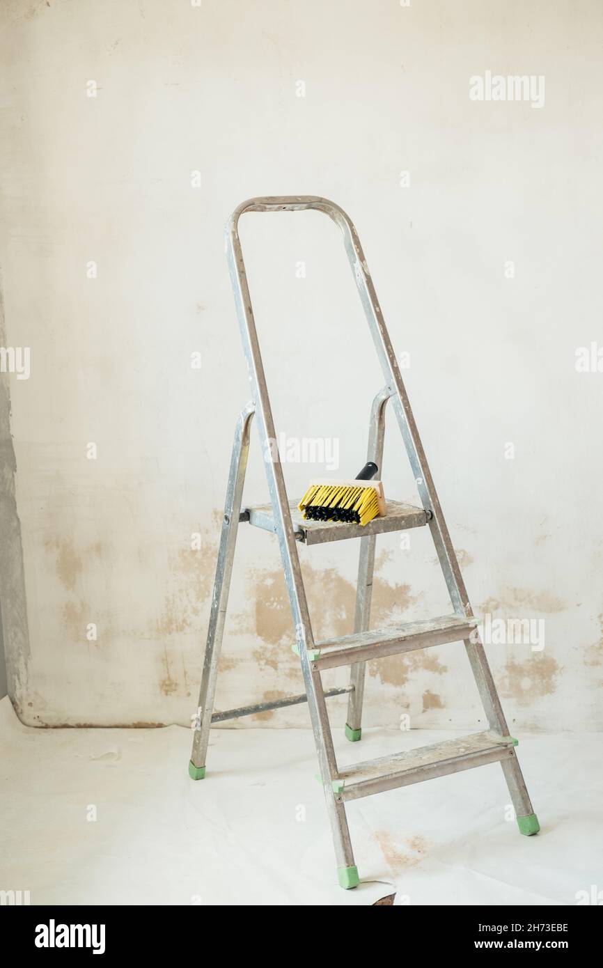 Building stepladder is in the empty room, prepared for renovation Stock ...