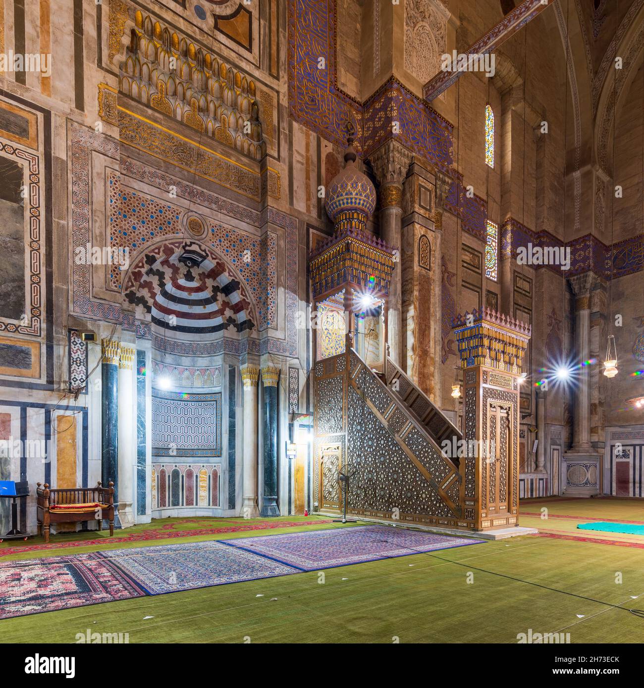 Colorful decorated marble wall with engraved Mihrab - niche - and ...