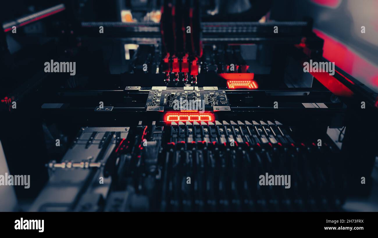 Motherboards computer chips production hi-res stock photography and ...