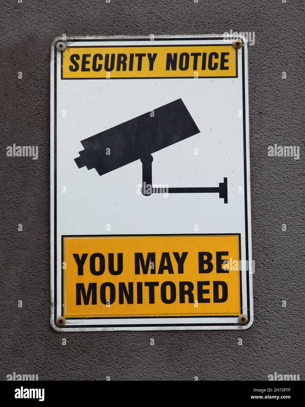 A security surveillance sign Stock Photo - Alamy