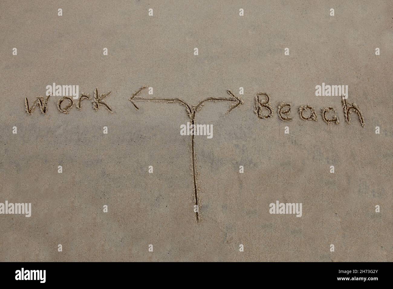 Work or Beach - decision time Stock Photo - Alamy