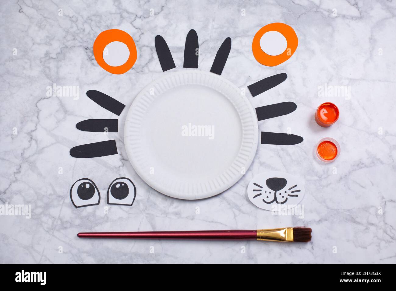 Step-by-step photo instruction on how to make a Tiger made of Paper ...