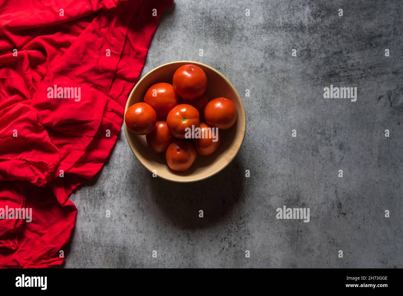 Cherry tomatoes in basket hi-res stock photography and images - Alamy