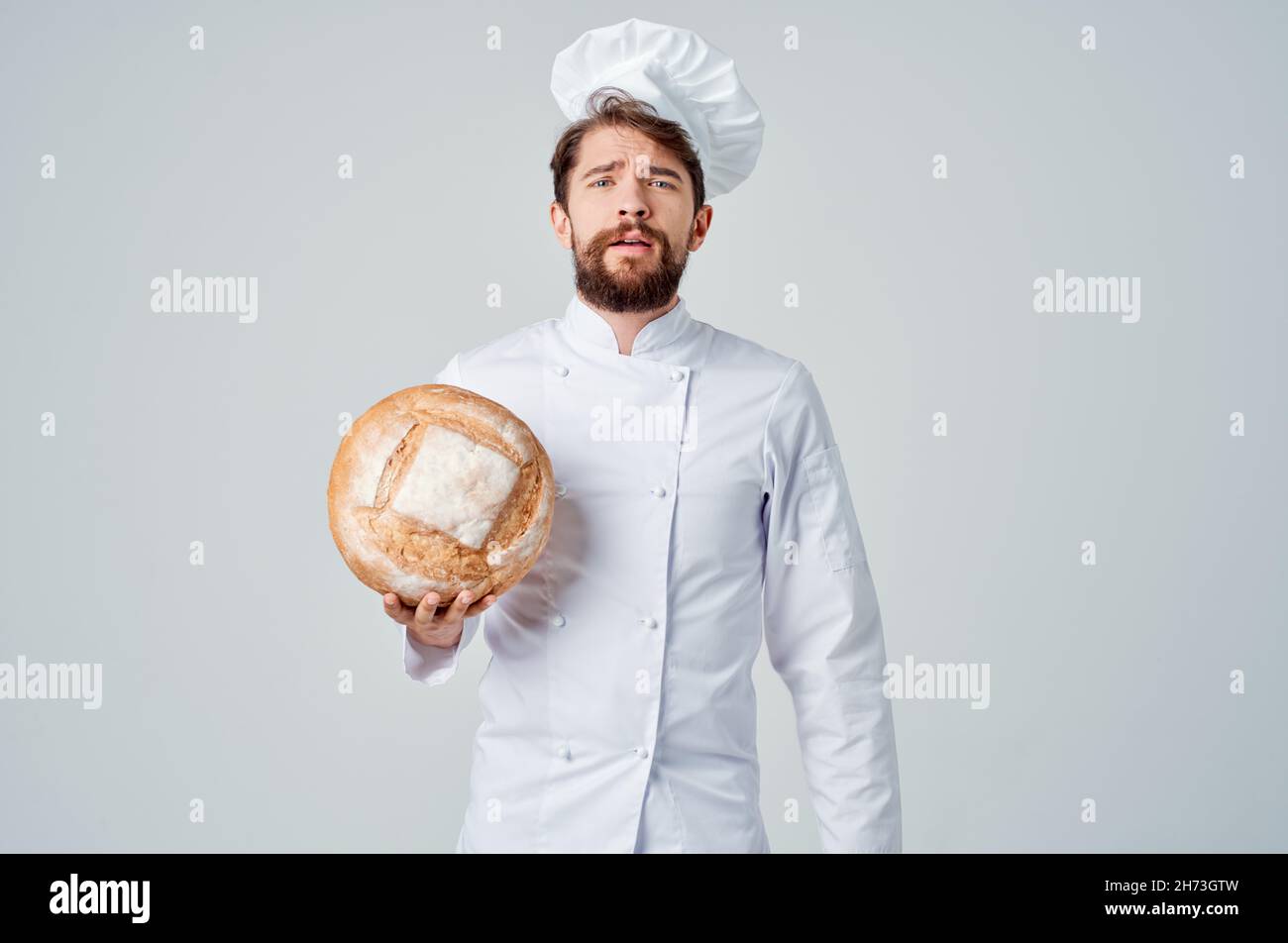bearded man chef with bread in hand Professional emotions Stock Photo ...