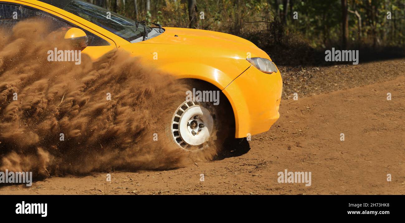 Rally race car drifting on dirt track Stock Photo - Alamy