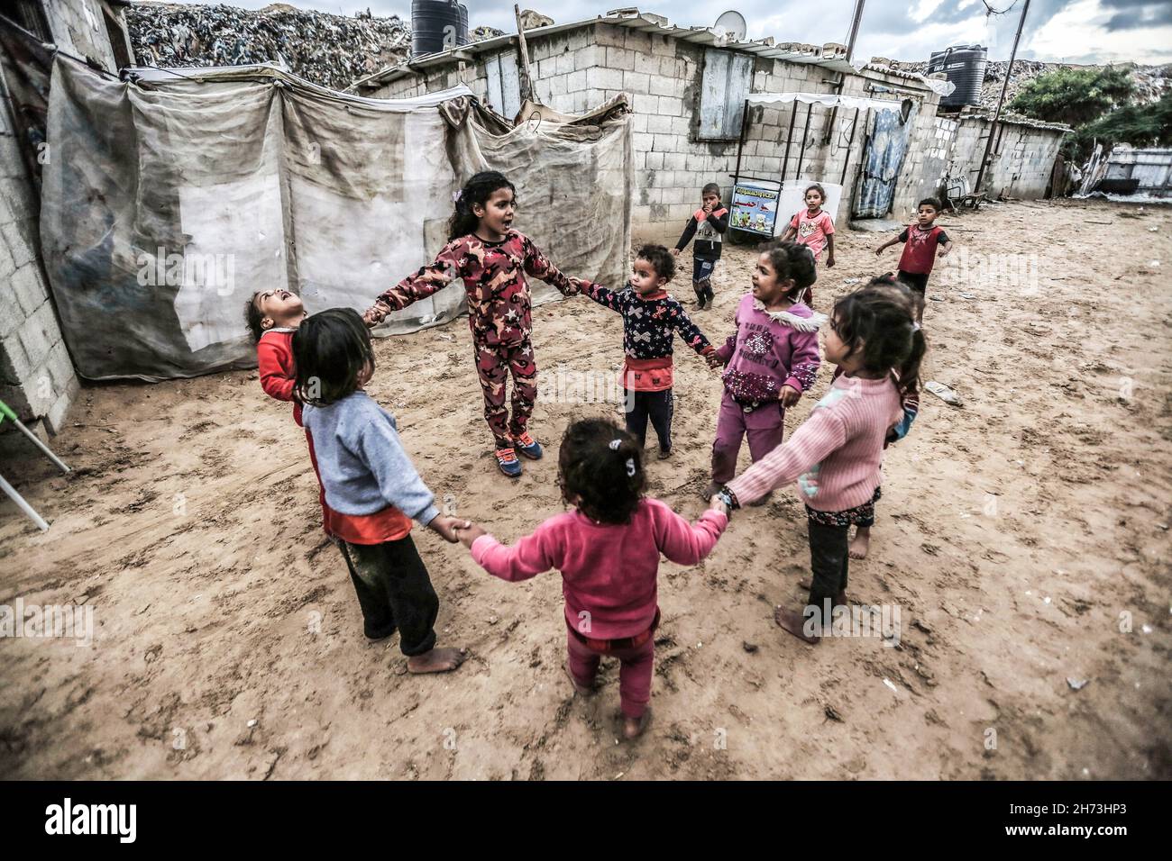 Gaza City, Palestine. 20th Nov, 2021. Palestinian children play in ...
