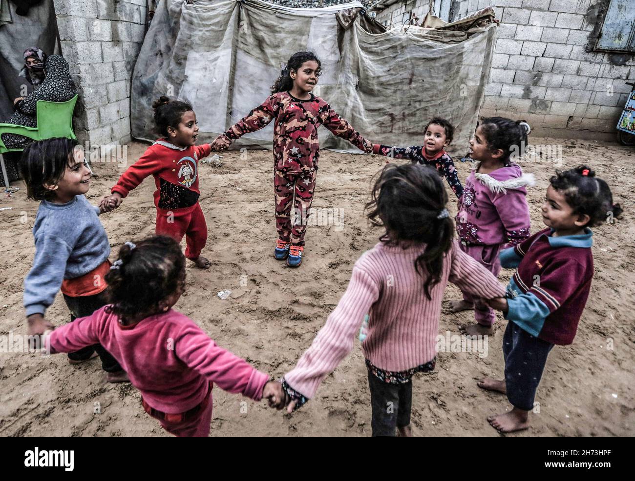 Gaza City, Palestine. 20th Nov, 2021. Palestinian children play in ...
