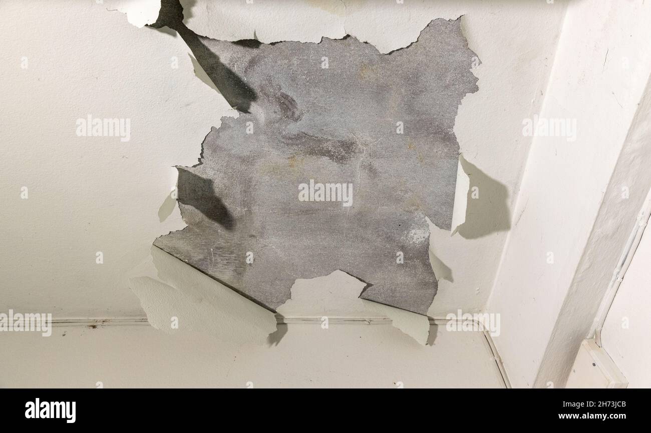 Water leaking from concrete slab porch into room below Stock Photo - Alamy