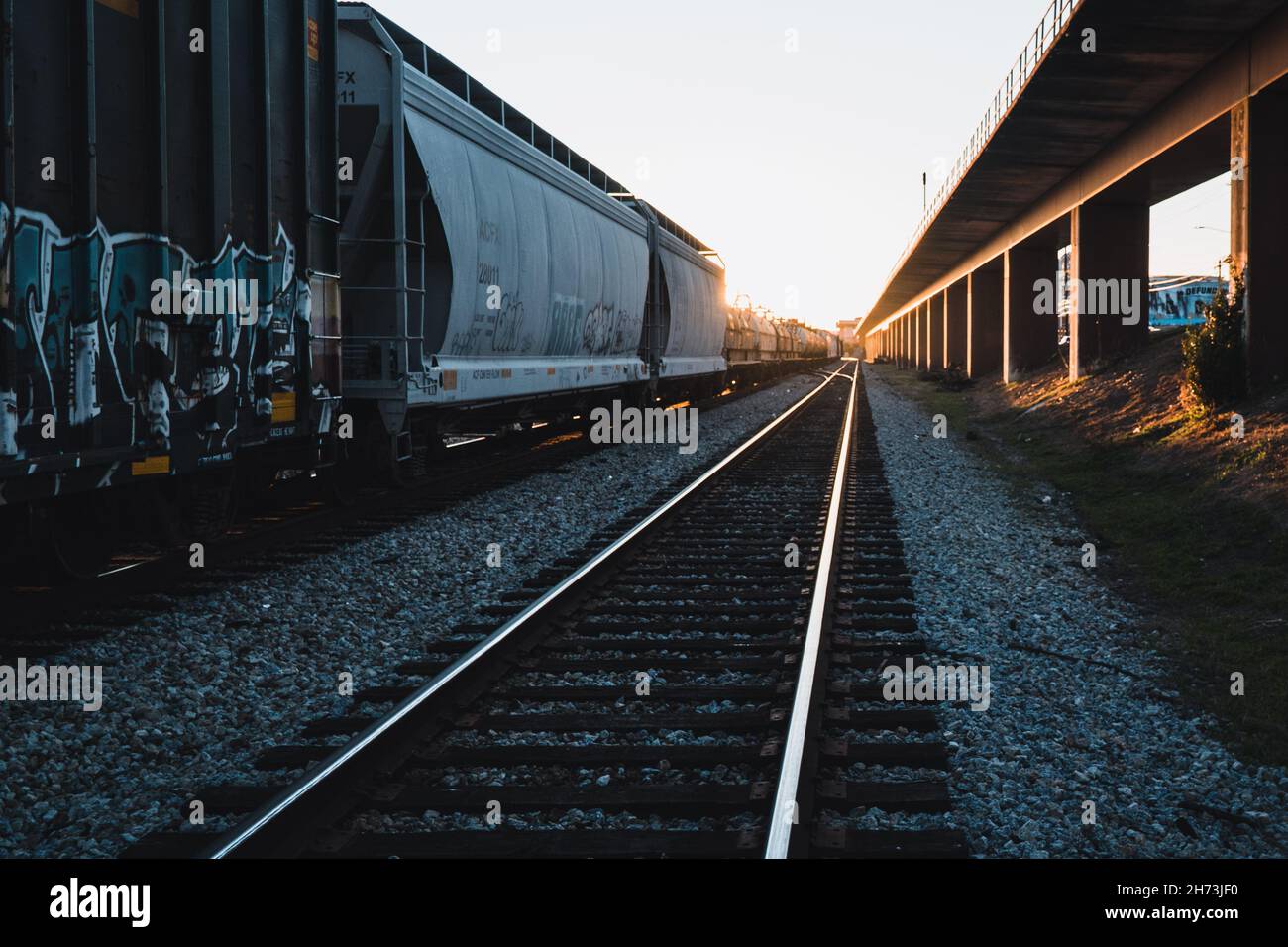 train during sunset Stock Photo - Alamy