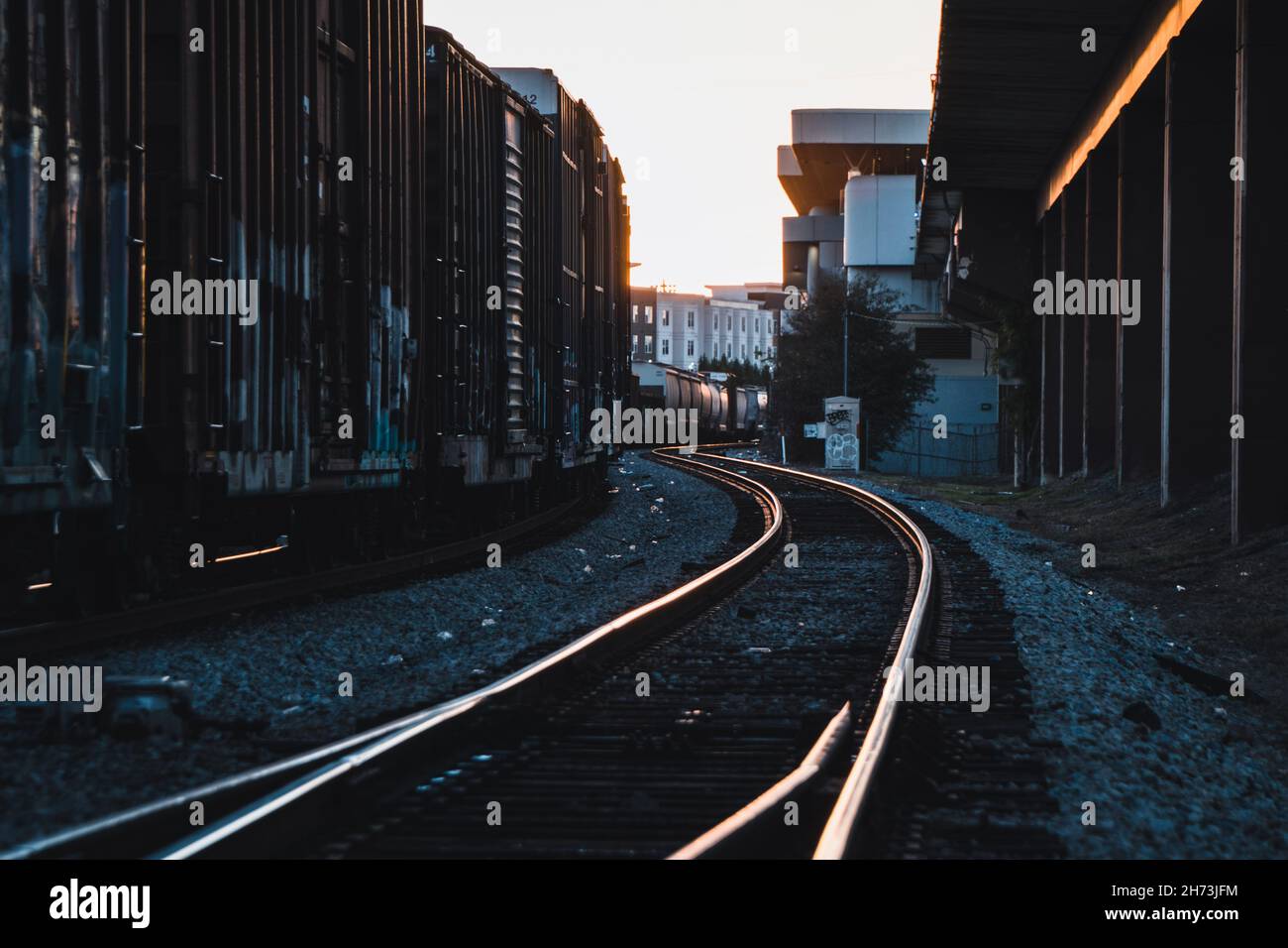 train during sunset Stock Photo - Alamy