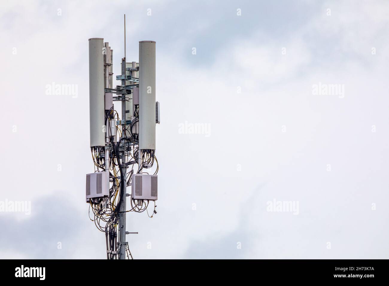 Telecommunication 5g tower on a background of blue sky Stock Photo - Alamy