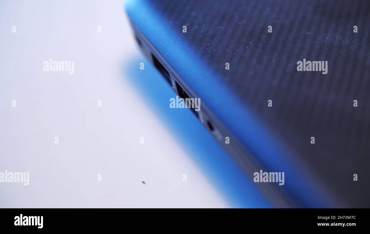 Process of charging device with a white USB cable. Close up of male ...