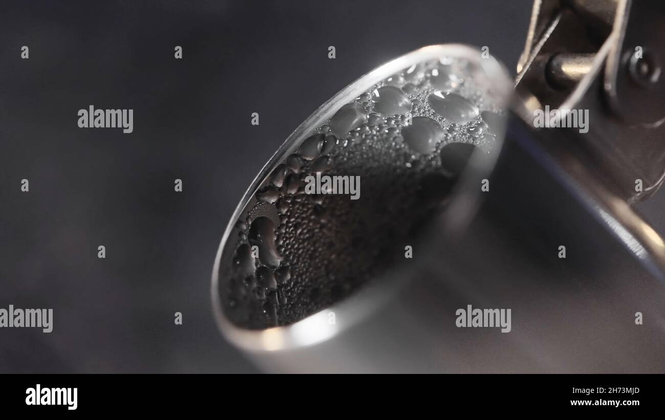 Teapot spout drops action close hi-res stock photography and images - Alamy