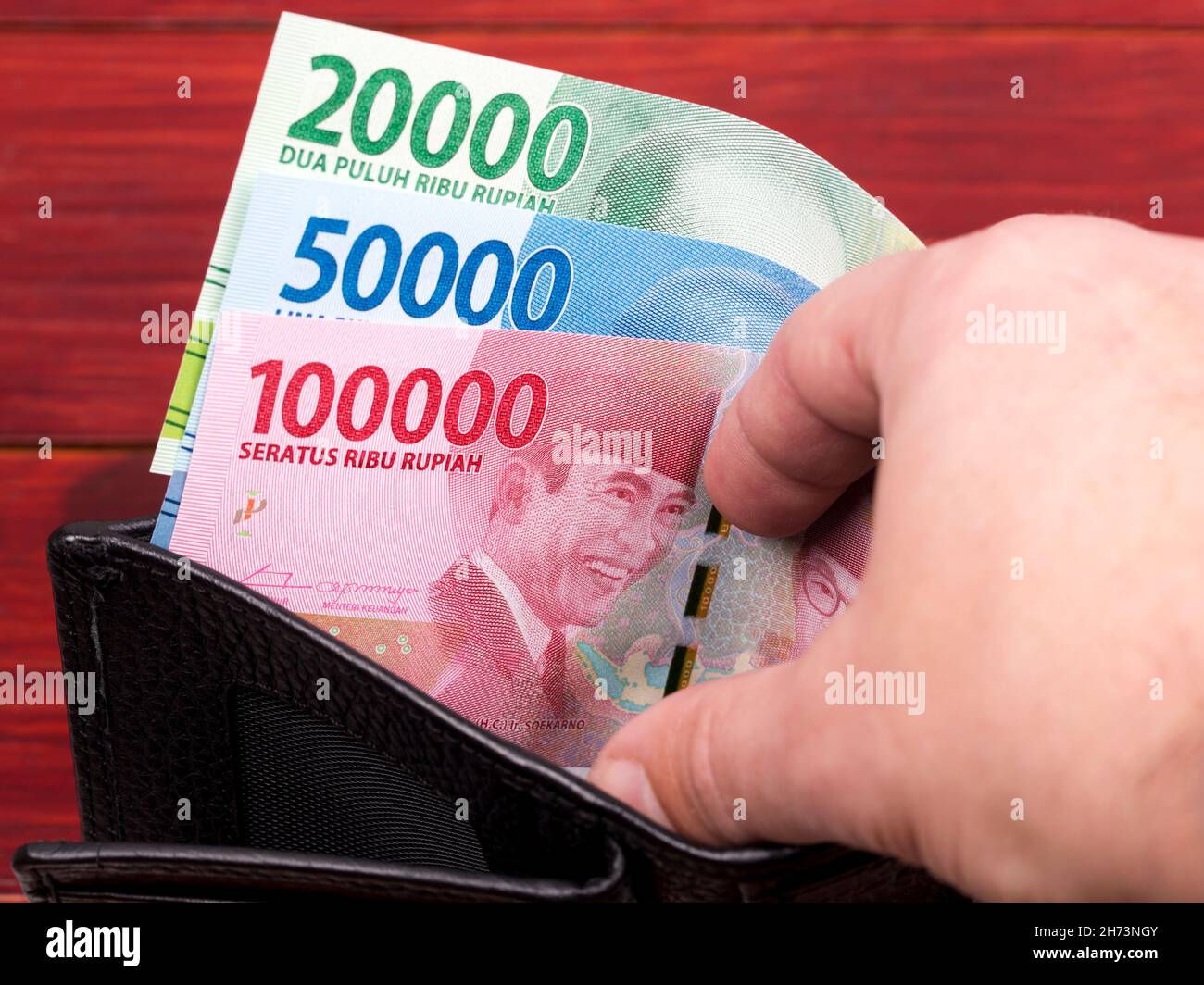 Indonesian rupiah note hi-res stock photography and images - Alamy