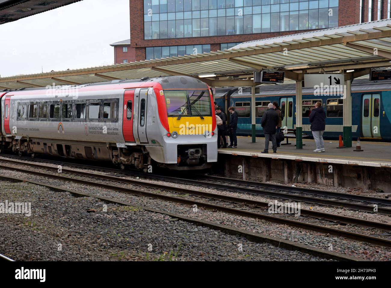 Passengers at Chester station catching their train, a Transport for ...