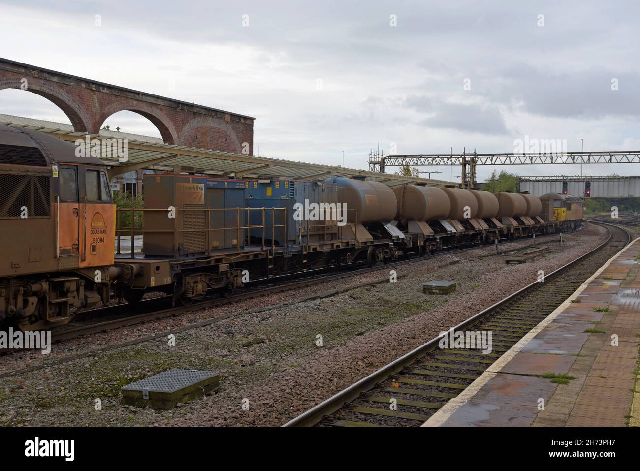 A Colas Rail Class 56 diesel locomotive stands at Chester Station with ...