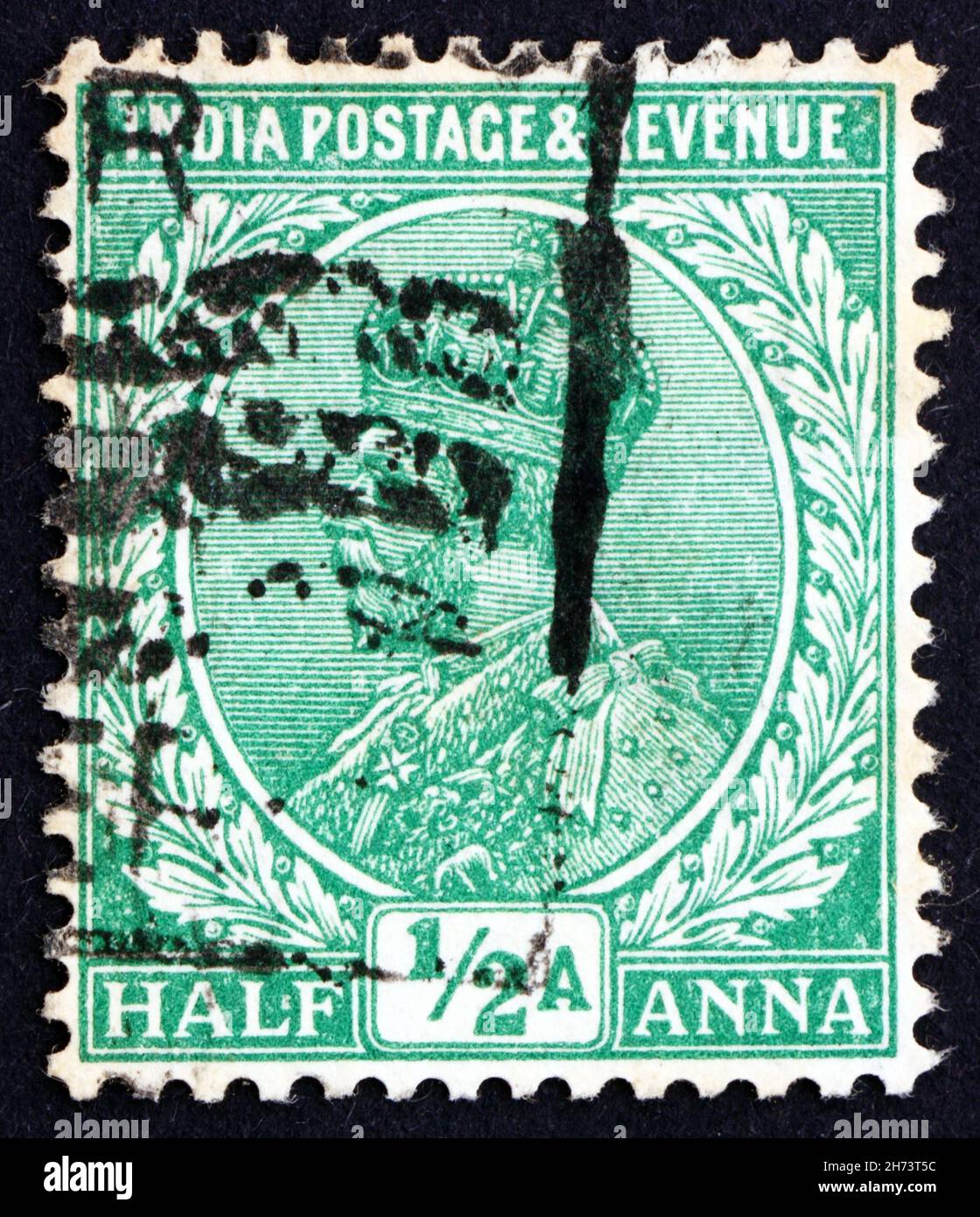 INDIA - CIRCA 1934: a stamp printed in India shows King George V ...