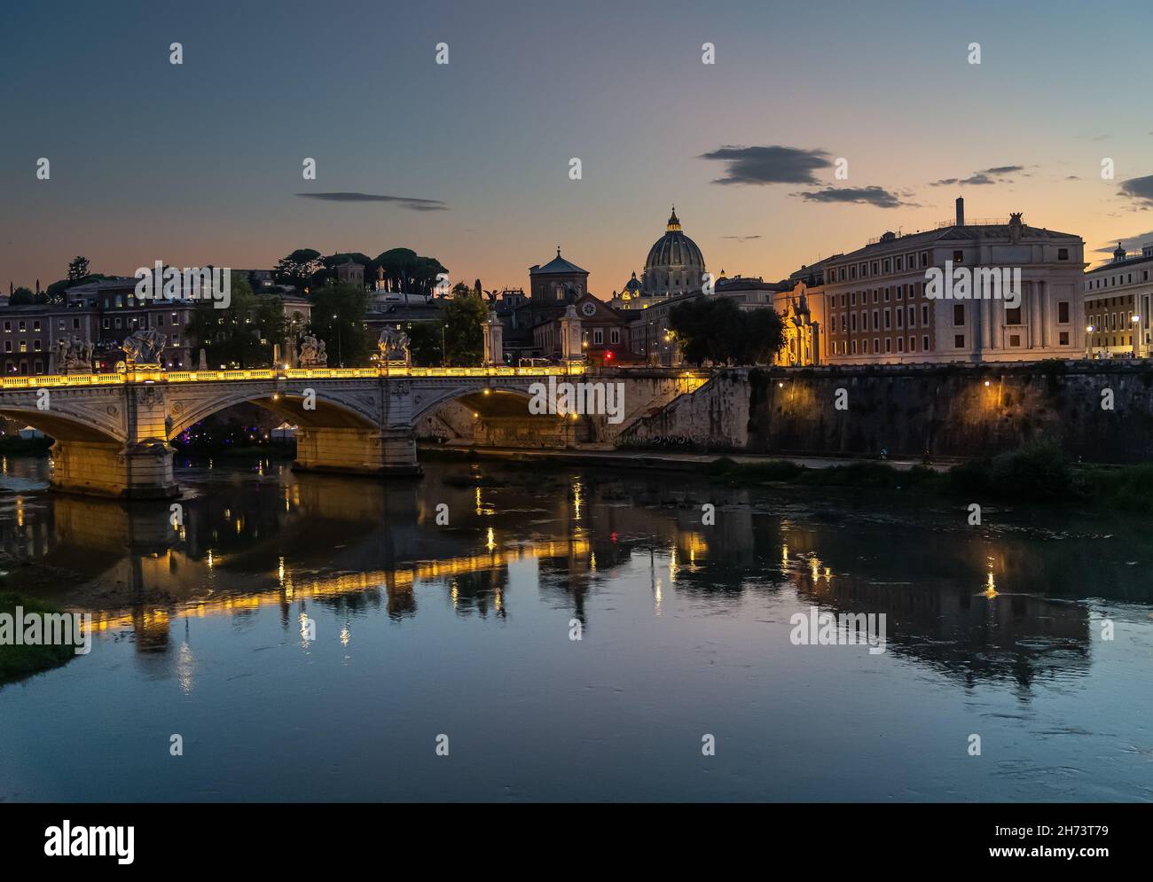 Rome sunset over Tiber and St Peters Basilica Vatican. Iconic landmarks ...