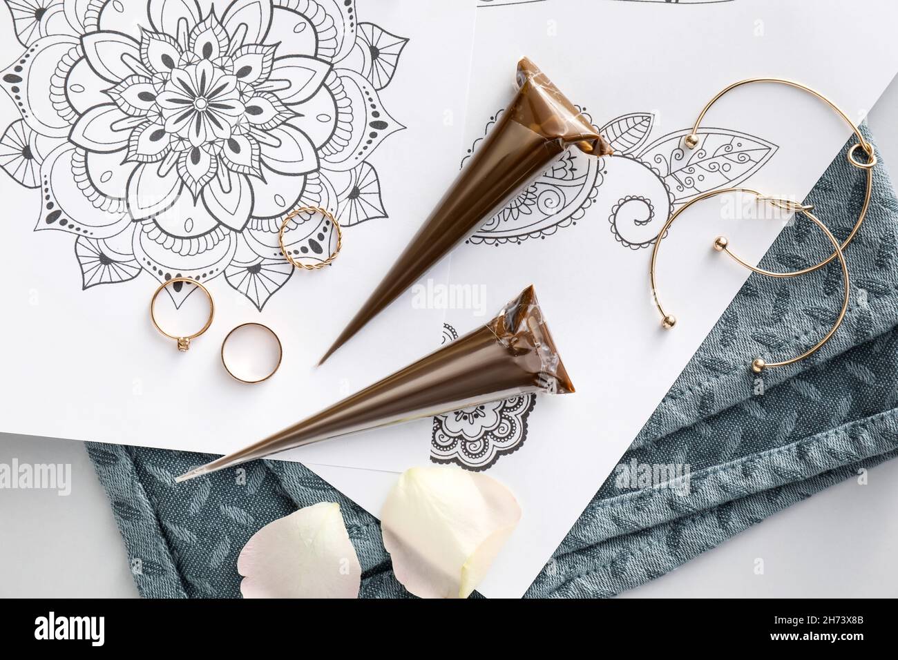 Henna paints and ornament examples, top view Stock Photo - Alamy