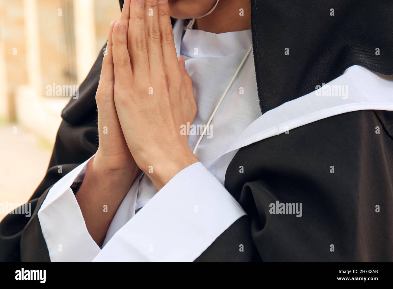 Girl praying outside hi-res stock photography and images - Alamy