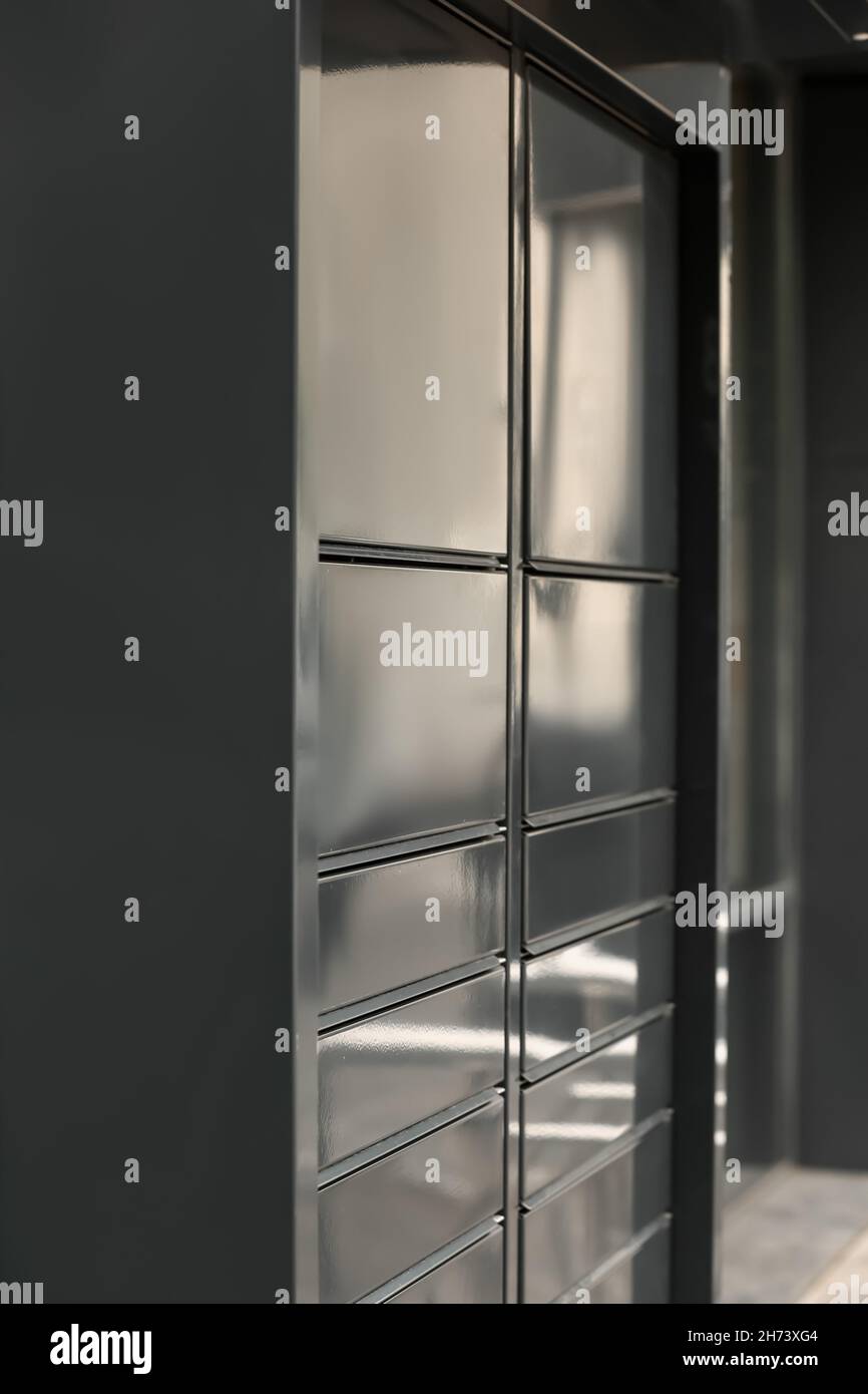 Automated self service post terminal machine Stock Photo - Alamy